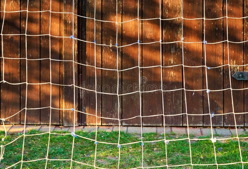 A Net Against a Wood Background Stock Photo - Image of copy, panel ...