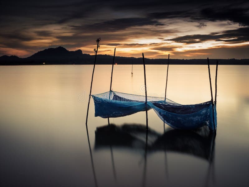 A Net on the Calm Water in Sunset Stock Photo - Image of scene ...