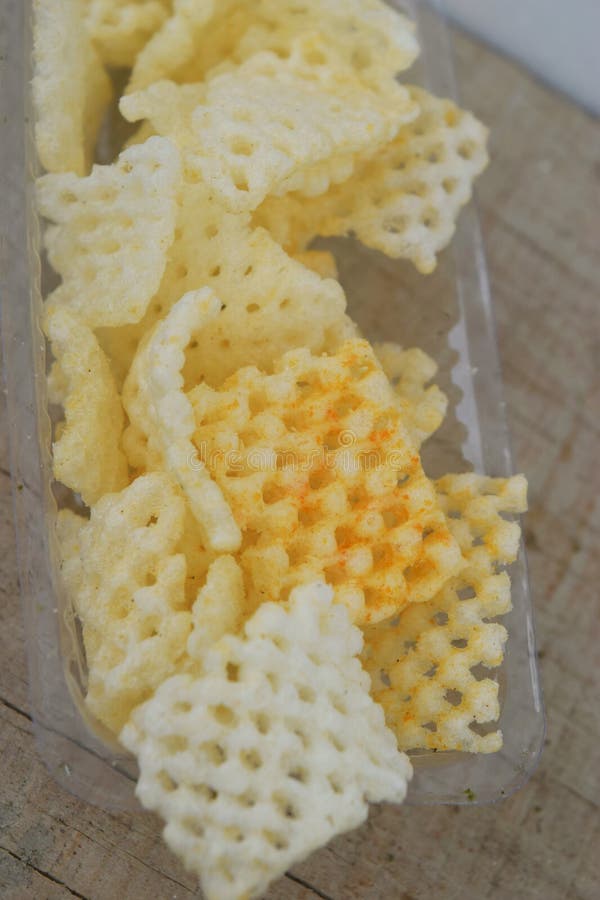 Net Chips in a Plastic Container is Good for Kids Stock Image - Image ...