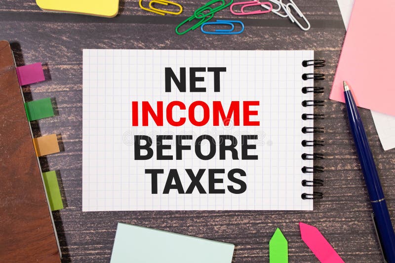 Net Income before Taxes, Text on White Paper on Torn Paper Background ...