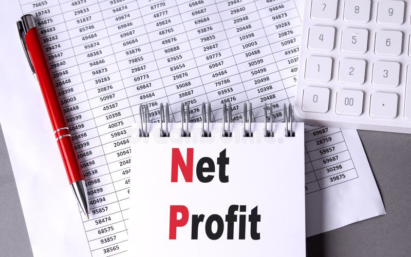 NET PROFIT Text on Notebook with Chart , Pen and Calculator Stock Image ...