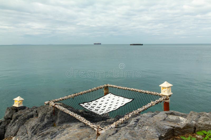 Net Seat with Sea Space and Boat Stock Image - Image of maldives, pool ...