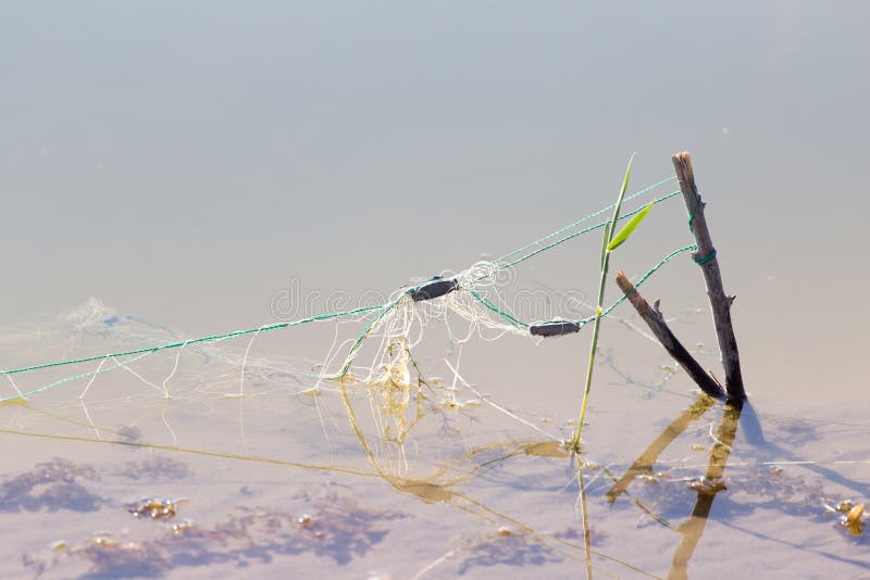 Net in the water stock image. Image of trap, nylon, tackle - 101945931