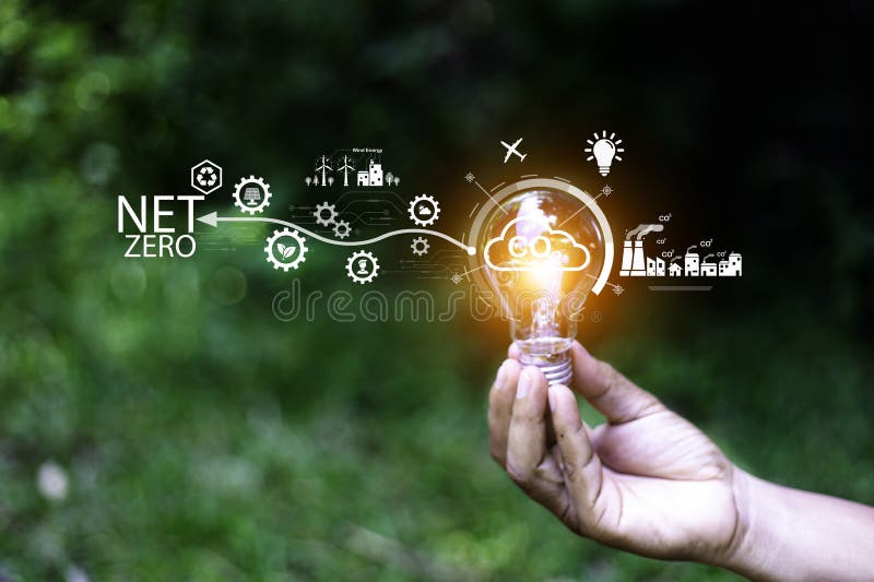 Net Zero Concept. Hand Holding Bulb with Net Zero Icon. it is ...