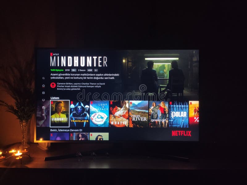 Netflix App on Tv Screen Playing and the `Mindhunter` Series Logo ...