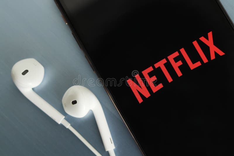 Netflix Logo on Computer Screen and Netflix Logo on Smartphone Screen ...