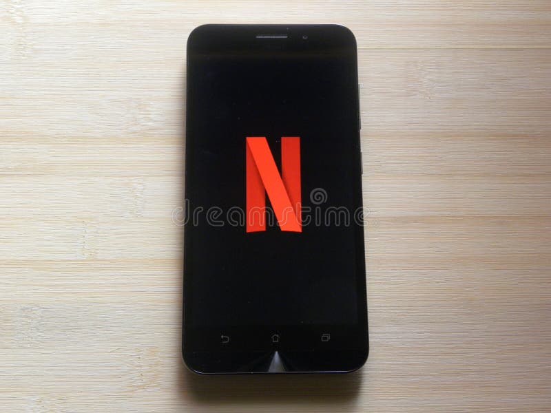 Netflix on smartphone editorial stock photo. Image of communication ...