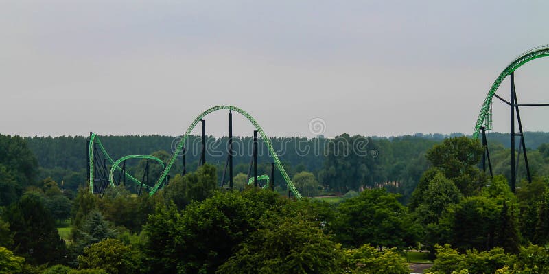 Thrilling Green Roller Coaster in Nature Editorial Stock Photo - Image ...
