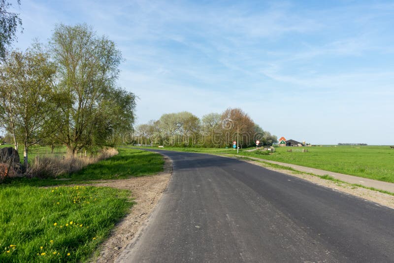 Netherlands,Wetlands,Maarken, a Path with Trees on the Side of a Road ...