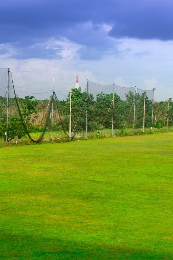 Nets on a Golf Course with Green Grass. Side of the Field Stock Image ...