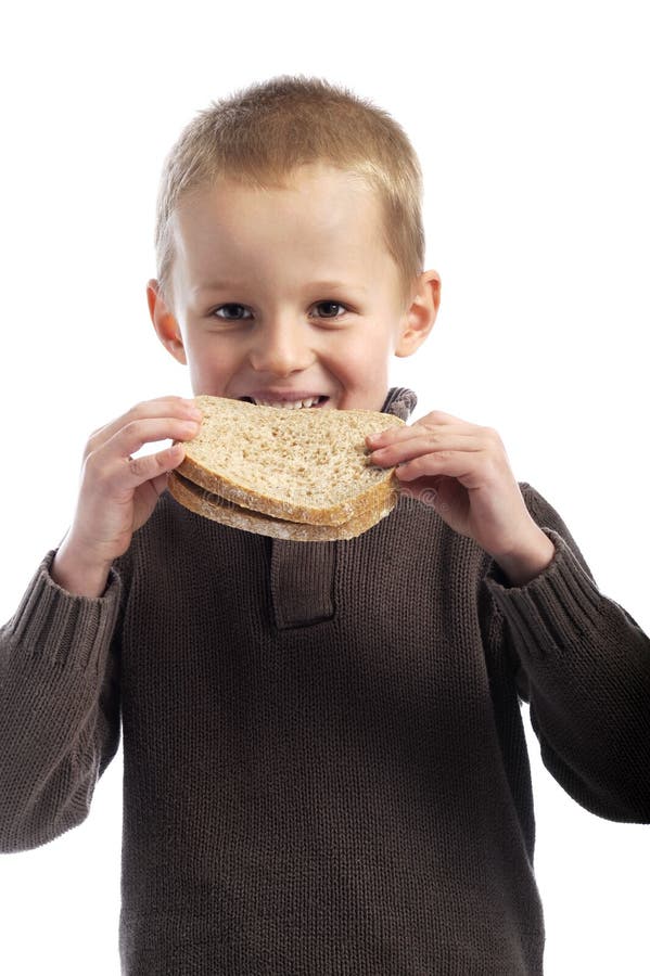 Netter Kleiner Junge, Der Scheiben Brot Isst Stockfoto - Bild von ...