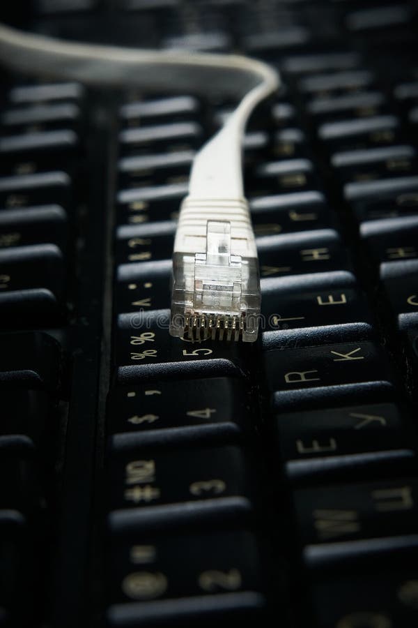 Network Cable on Keyboard, Internet, Worldwide Network. Stock Image ...