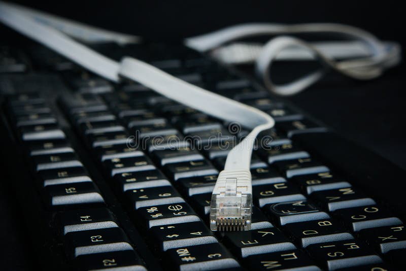 Network Cable on Keyboard, Internet, Worldwide Network. Stock Photo ...