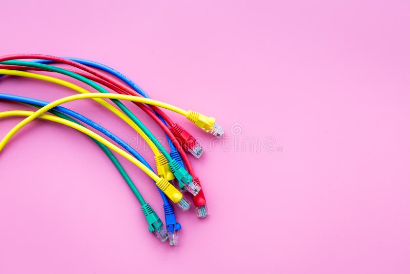 Network Colored Cables for Computer on Pink Background Top View ...