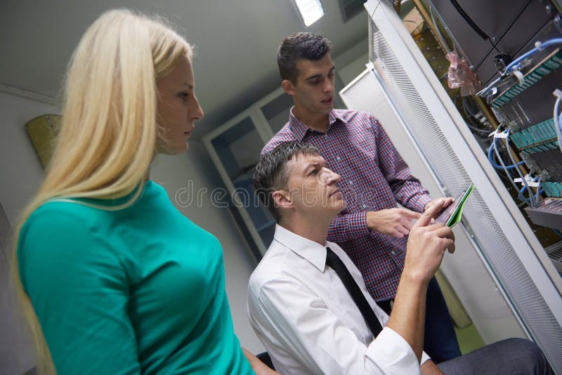 Network Engeneers Working in Network Server Room Stock Photo - Image of ...
