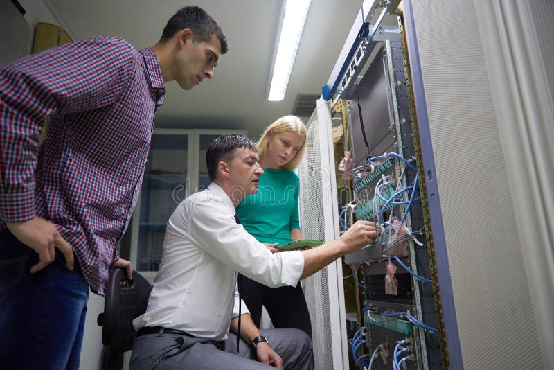Network Engeneers Working in Network Server Room Stock Photo - Image of ...