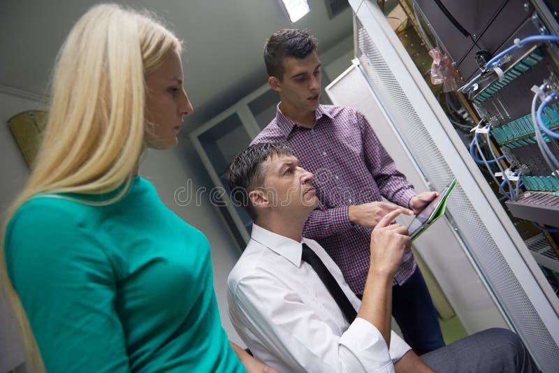 Network Engeneers Working in Network Server Room Stock Photo - Image of ...