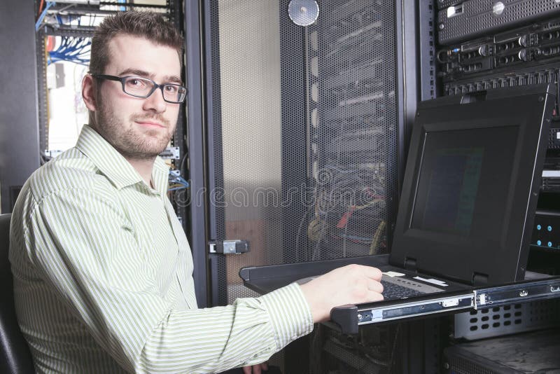 Network Engineer Working in Server Room Stock Photo - Image of system ...