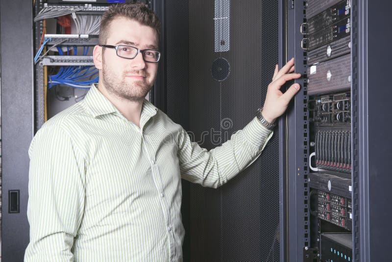 Network Engineer Working in Server Room Stock Photo - Image of ... Network Engineer Working in Server Room Stock Photo - Image of ...
