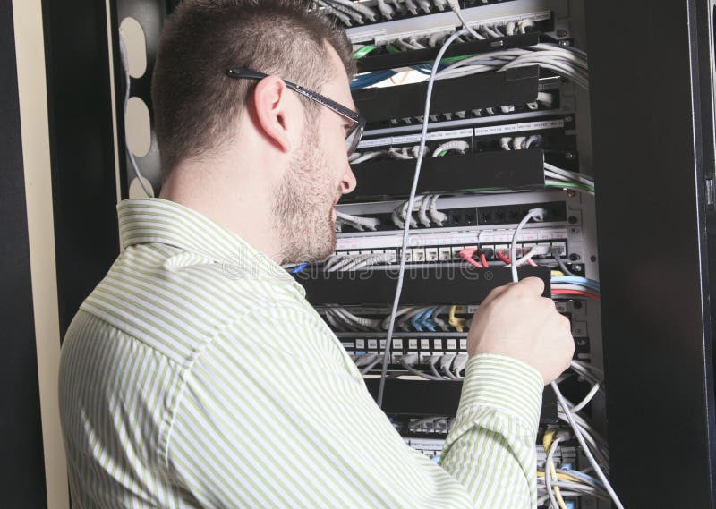 Network Engineer Working in Server Room Stock Image - Image of ...