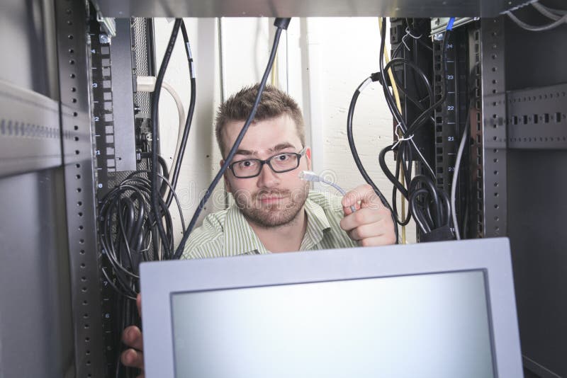 Network Engineer Working in Server Room Stock Photo - Image of ... Network Engineer Working in Server Room Stock Photo - Image of ...