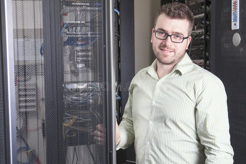 Network Engineer Working in Server Room Stock Image - Image of storage ...