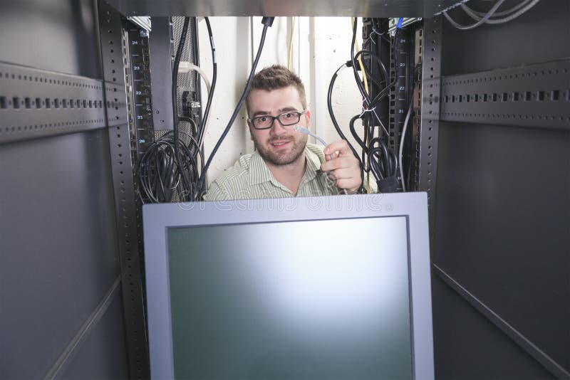 Network Engineer Working in Server Room Stock Image - Image of computer ... Network Engineer Working in Server Room Stock Image - Image of computer ...