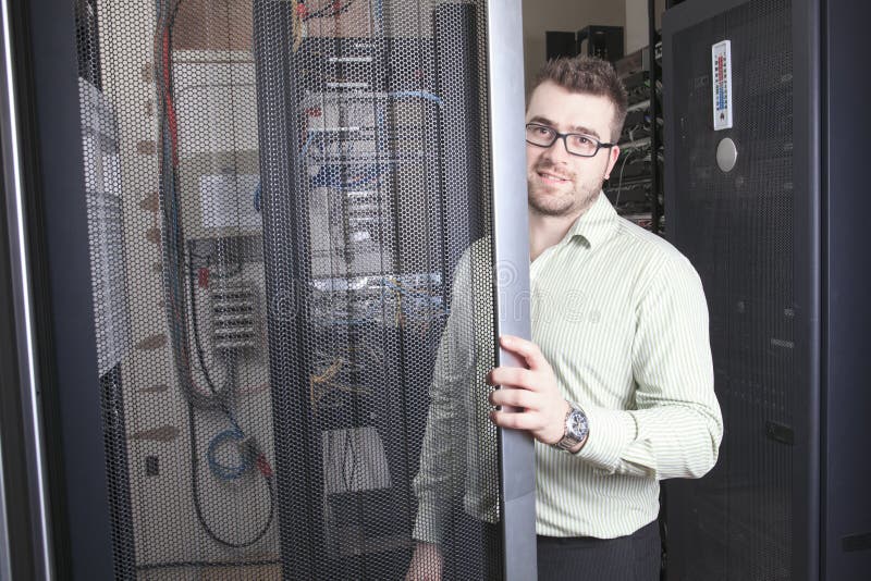 Young it Engeneer in Datacenter Server Room Stock Photo - Image of professional, businessman ...