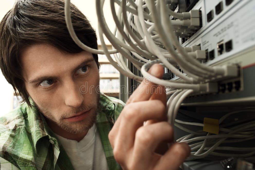 Network Engineer Working in Server Room Stock Photo - Image of fixing ...