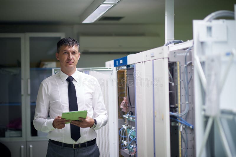 Network Engineer Working in Server Room Stock Photo - Image of center ...