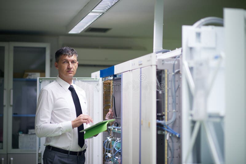 Network Engineer Working in Server Room Stock Photo - Image of fashion ...
