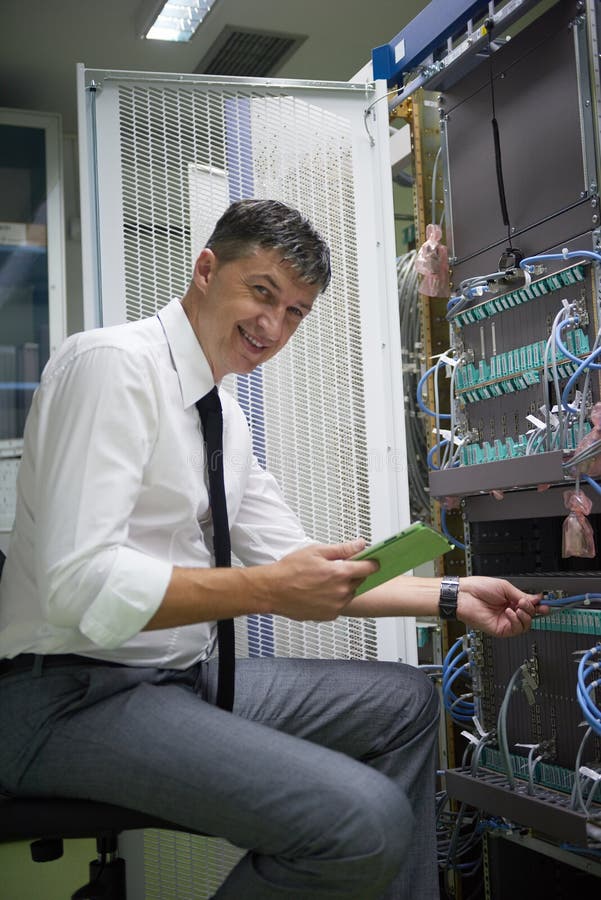 Network Engineer Working in Server Room Stock Photo - Image of server ...