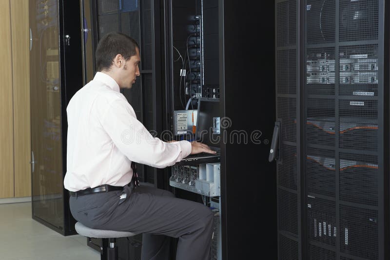 Network Engineer Working in Server Room Stock Photo - Image of ...