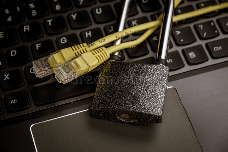 Network Ethernet Cables in Padlock on Black Computer Keyboard. Stock ...