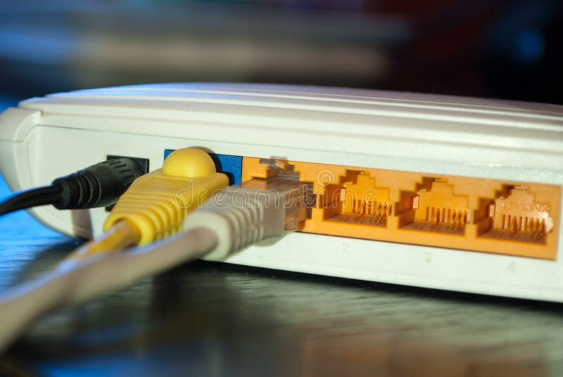 Network Internet Cable Plugs in Wifi Router Stock Photo - Image of line ...