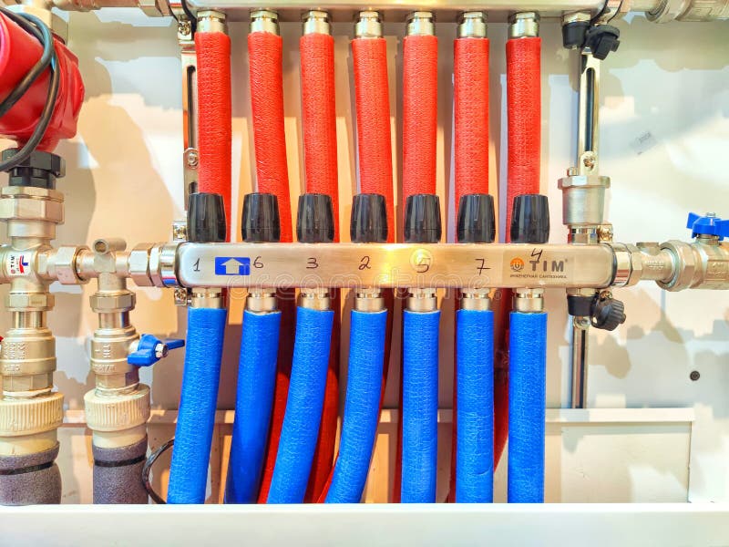 Network of Pipes Attached To Wall. Multiple Interconnected Pipes ...