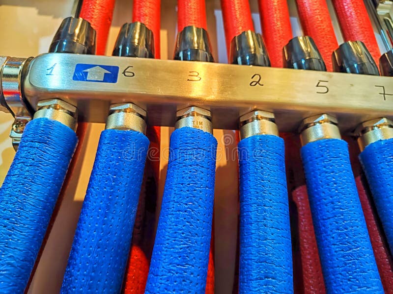 Network of Pipes Attached To Wall. Multiple Interconnected Pipes ...