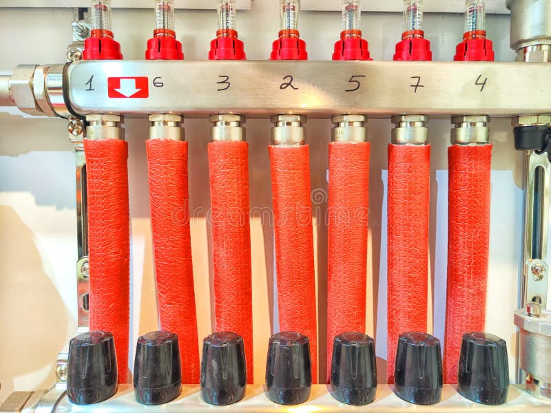 Network of Pipes Attached To Wall. Multiple Interconnected Pipes ...