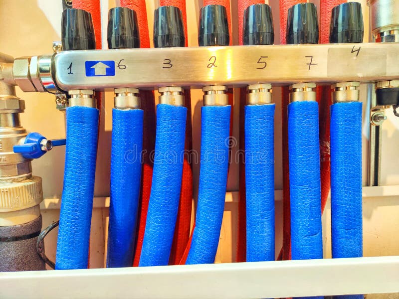 Network of Pipes Attached To Wall. Multiple Interconnected Pipes ...