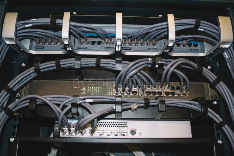 Network Server Rack with Colored Cables and Ethernet Switches in the ...