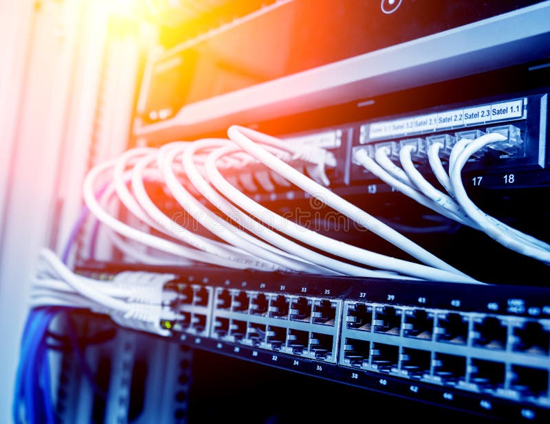 Network Switch and Ethernet Cables in Red and White Colors. Data Center ...