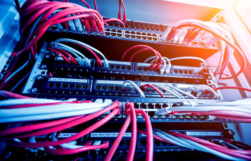 Network Switch and Ethernet Cables in Red and White Colors. Data Center ...