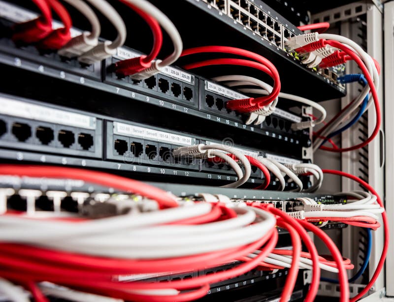 Network Switch and Ethernet Cables in Red and White Colors. Data Center ...