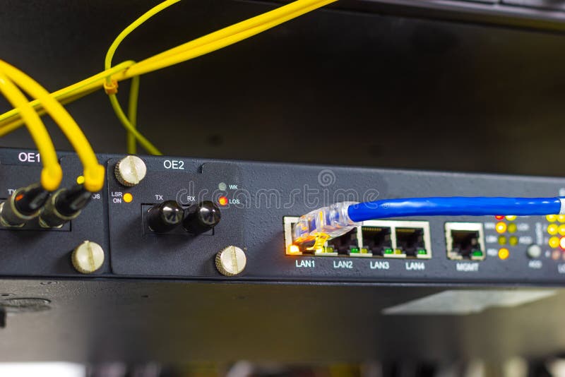 Network Switch in Rack, Network Cables Connect SFP Module Port in the ...
