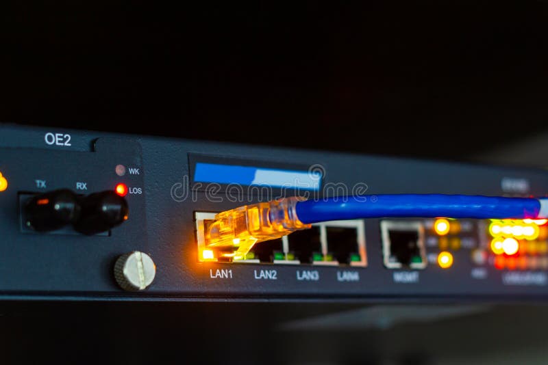 Network Switch in Rack, Network Cables Connect SFP Module Port Stock ...