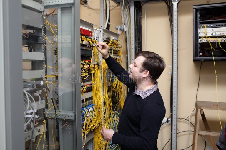 Network Technician at Server Room Stock Photo - Image of hardware ...