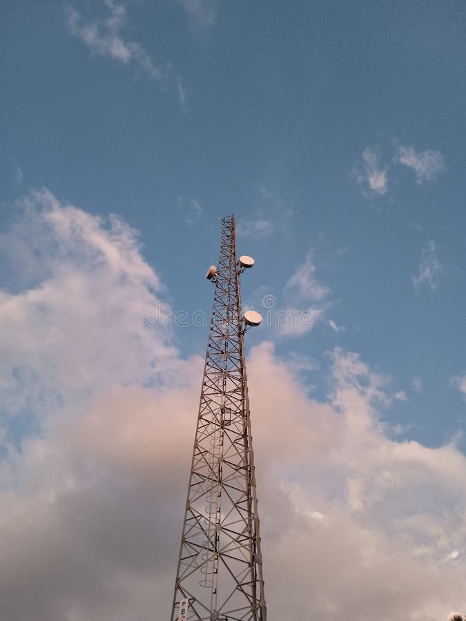Network tower on the beach stock photo. Image of cool - 263155612