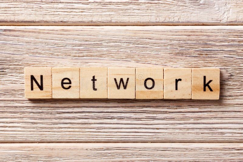 Network Word Written on Wood Block. Network Text on Table, Concept ...