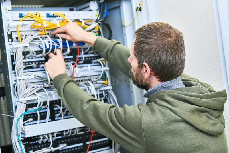 Network Engineer Admin Works with Server Equipment Stock Photo - Image ...