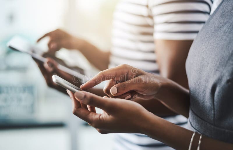 Networking Done in the Digital Age. Closeup Shot of Businesspeople ...